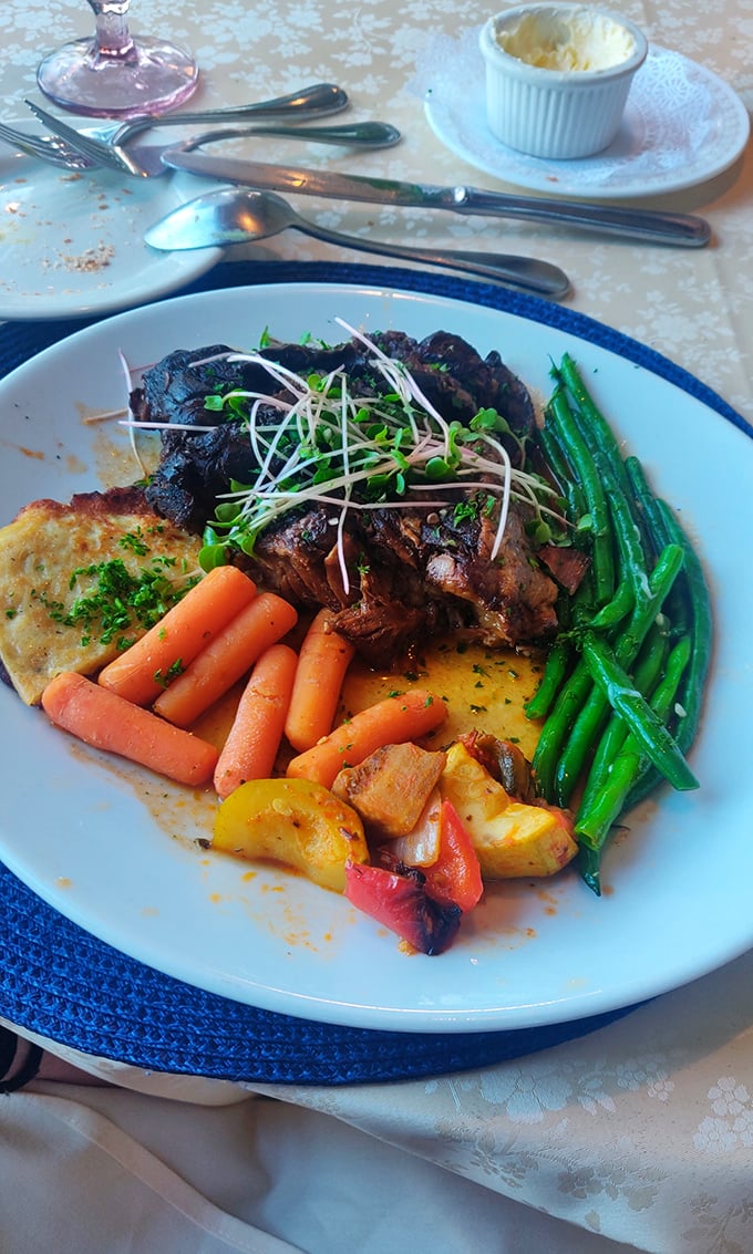 A symphony of flavors on one plate—the steak conducts while the colorful vegetables play supporting roles with distinction. 