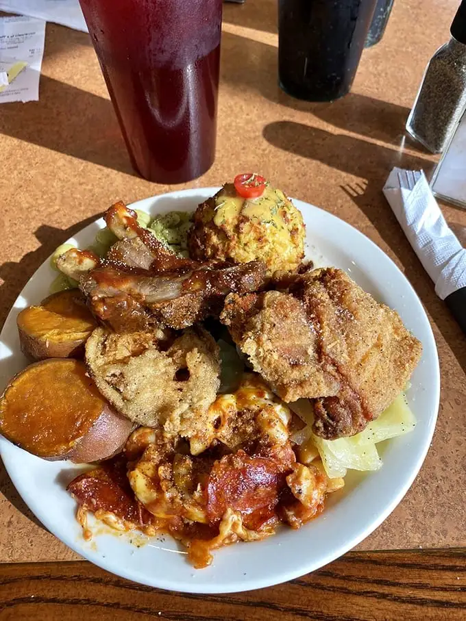 Southern hospitality on a plate—where fried perfection meets garden-fresh sides. This isn't just dinner; it's a warm hug from the inside out.