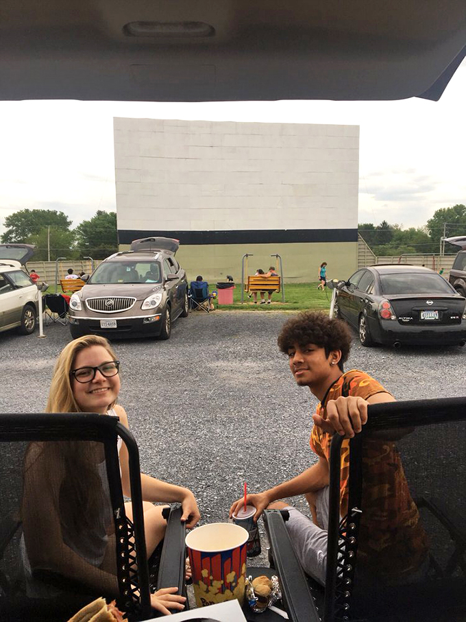 Movie night al fresco: where folding chairs become luxury seating and the biggest screen in Virginia awaits your viewing pleasure.