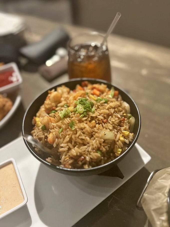 This isn't just rice—it's a seafood treasure hunt where every forkful reveals sweet morsels of shrimp and vegetables in perfect harmony.