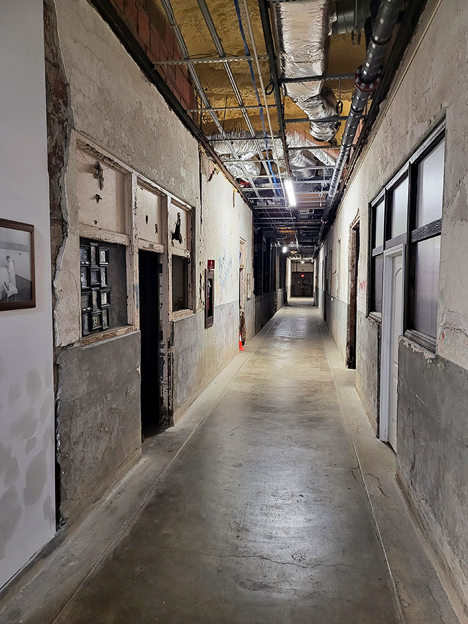 Time stands still in these abandoned corridors where peeling paint and graffiti tell stories of those who came after the patients left—or did they?