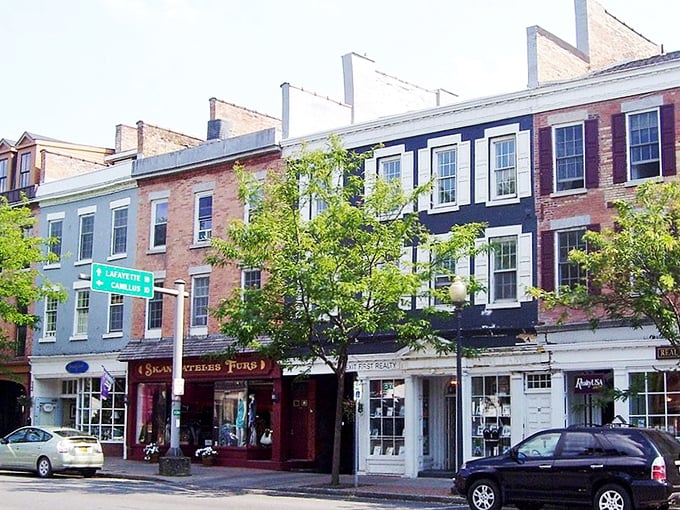 Colorful storefronts with personalities as distinct as their menus line the main drag, each promising unique flavors and shopping treasures.