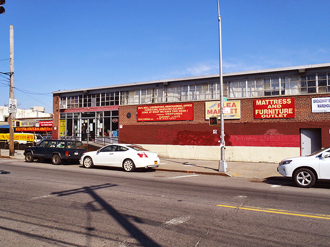 Today Flea Market (Elmhurst): Red brick, big dreams! Behind this no-nonsense exterior lies a labyrinth of treasures that would make Indiana Jones rethink his career choice.