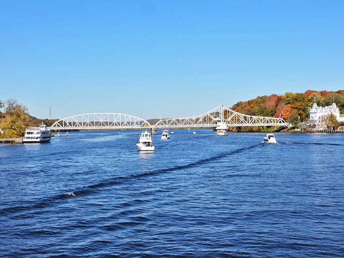 The East Haddam Swing Bridge stretches across the Connecticut River like a steel sentinel. Boats glide beneath while cars rumble above—transportation ballet at its finest.