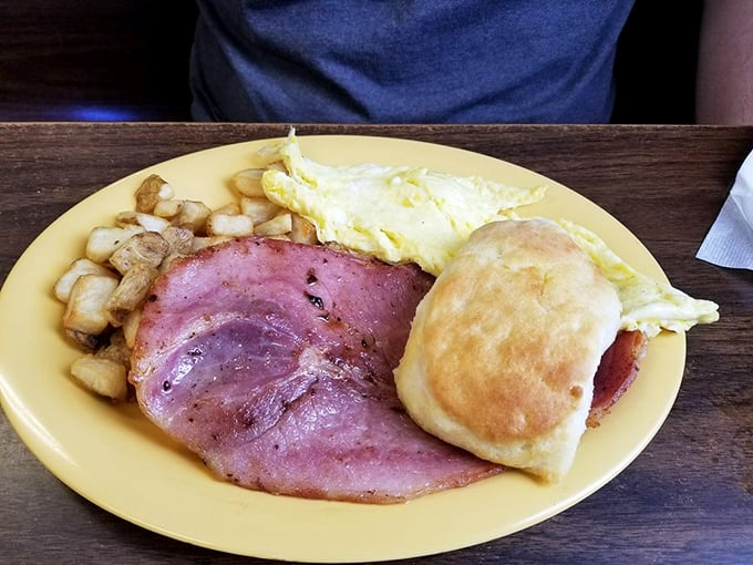 This plate has everything a hardworking Virginian needs to start the day—protein, carbs, and the kind of biscuit that makes grandmothers nod in approval.