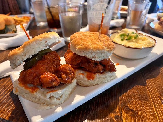 These hot chicken sliders aren't playing around—they're the kind of spicy-sweet perfection that makes you forget your table manners.