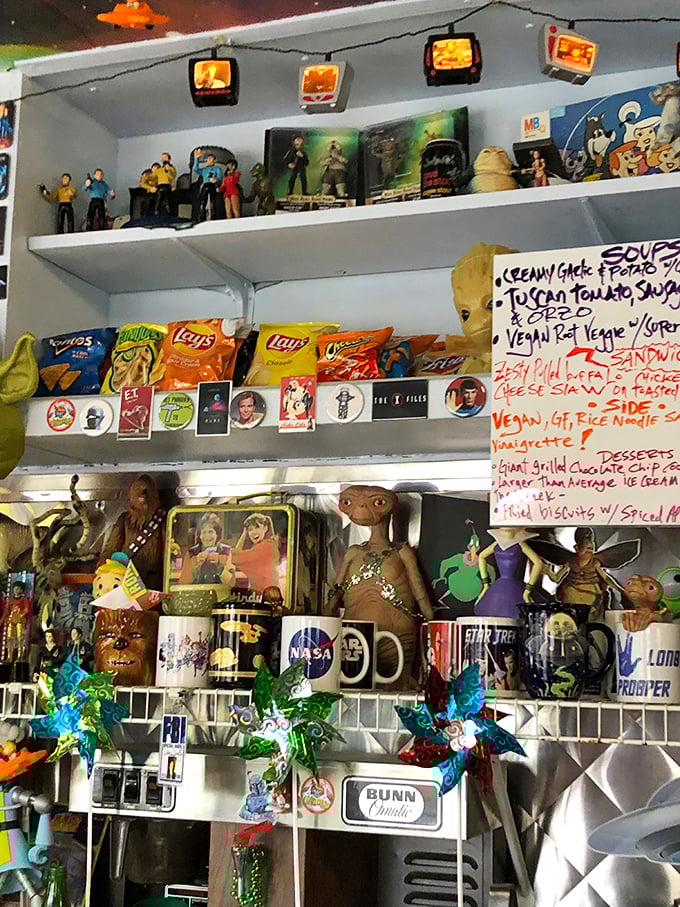 Every inch of wall space serves as a shrine to sci-fi fandom, with collectibles from Star Wars, Trek, and beyond watching over your meal.