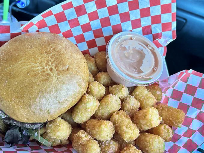 The Mushroom Swiss burger with tots—a combination so perfect it makes you wonder why we bother with fancy restaurants at all.