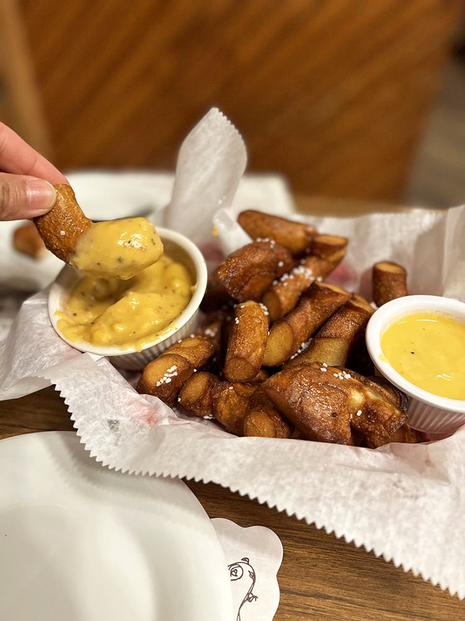 These pretzel nuggets aren't just appetizers—they're golden-brown ambassadors of joy, complete with dipping sauces that deserve their own fan club.