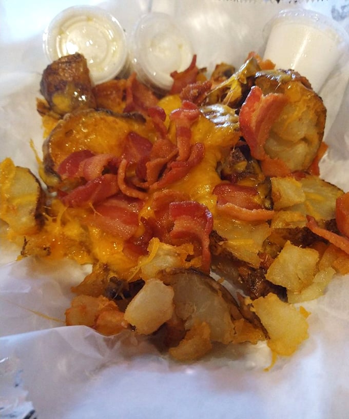 Redneck Potato Skins: where potatoes, cheese, and bacon achieve their highest purpose. Fancy restaurants charge triple for less satisfaction.