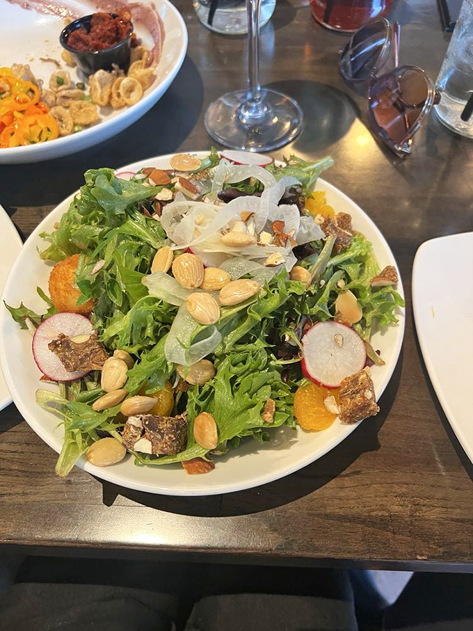 Even the salads demand attention—proof that vegetables can party too when dressed appropriately. 