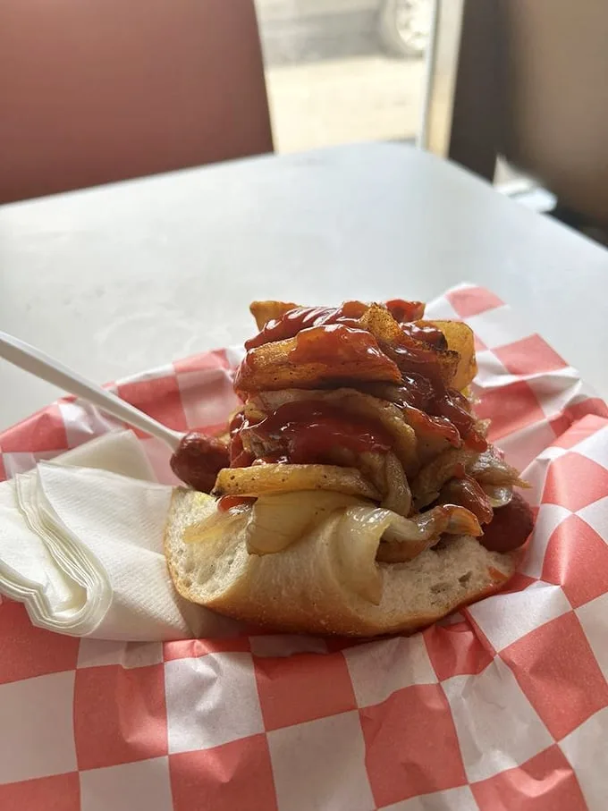 The combo doesn't ask for your approval—it commands your respect with its towering layers of sausage, potatoes, and peppers.