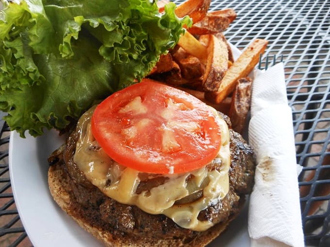 This isn't just a burger—it's a masterclass in international relations between beef, cheese, and garden-fresh toppings.