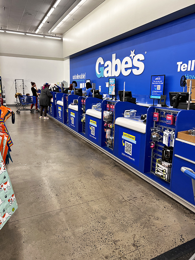 The blue checkout counter—final destination for victorious bargain hunters and their newfound treasures.