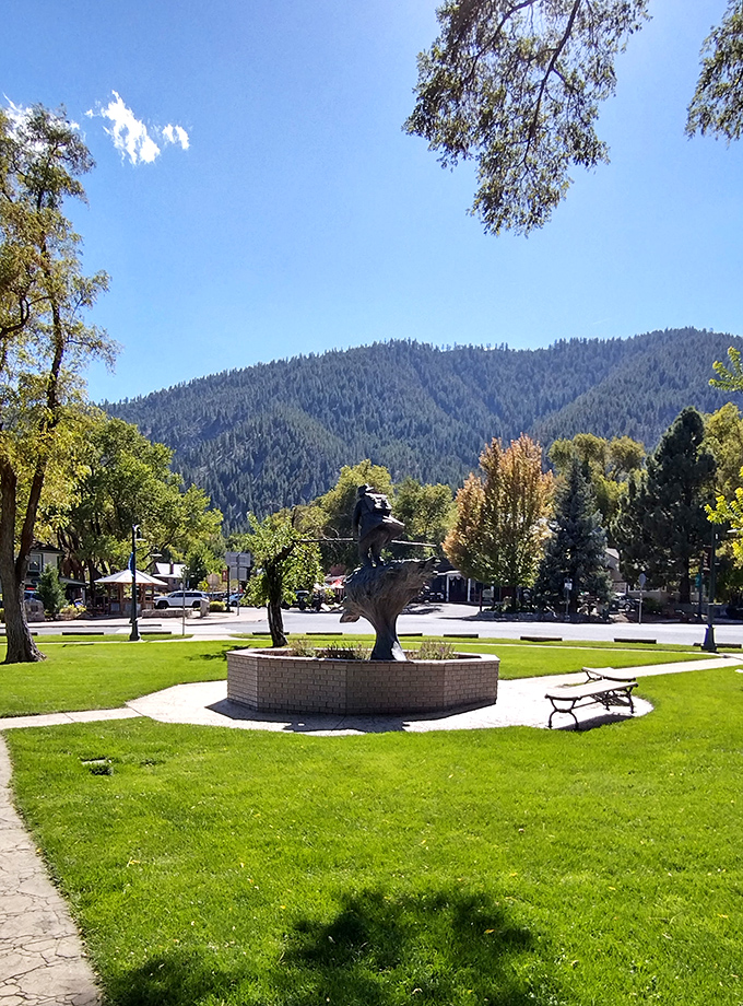 The town park offers a perfect respite with its manicured lawn, stately trees, and a fountain that seems to say, "Sit a spell, won't you?"