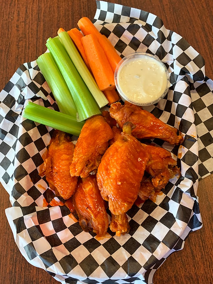 These wings aren't just playing backup to the cheesesteaks; they're auditioning for their own headline act with crispy, saucy confidence.