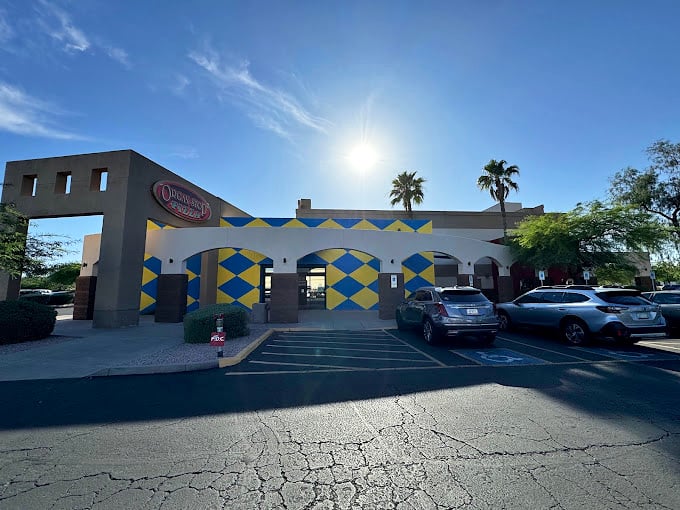 Organ Stop's playful blue and yellow exterior promises something different – because pizza with a Wurlitzer soundtrack is unforgettable.