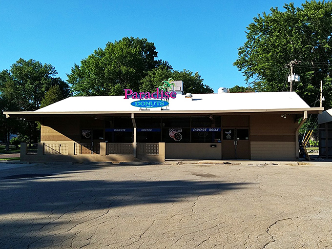 Paradise Donuts' humble roadside stand proves heaven doesn't need pearly gates—just perfect pastry and a pot of coffee.