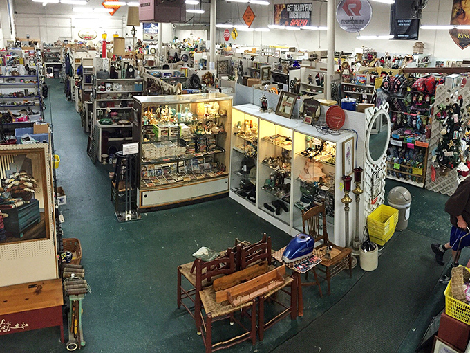 Fluorescent lights illuminate Yankee Flea's labyrinth of display cases, where collections of yesterday wait for tomorrow's homes.