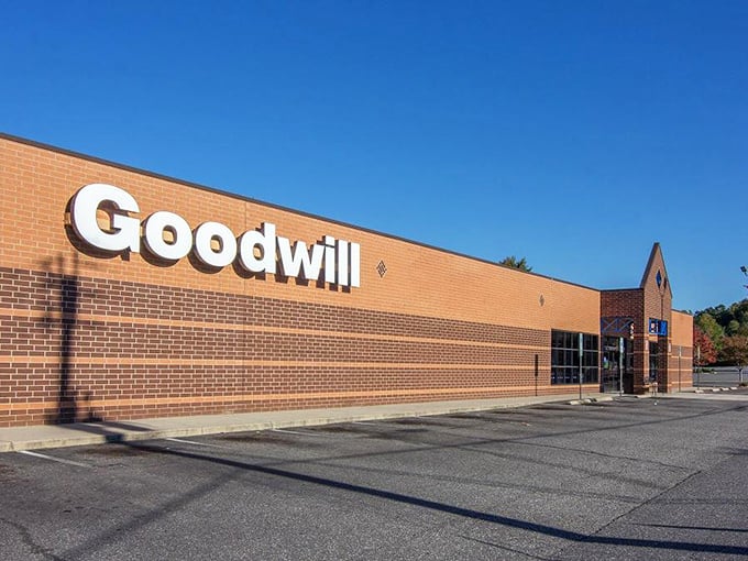 Sunlight bounces off Goodwill's brick exterior, beckoning bargain hunters inside. The mothership of secondhand treasures!