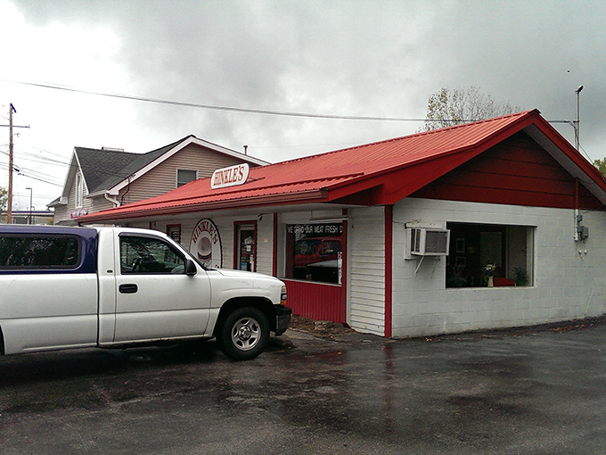 This humble white building houses burger wisdom passed down through generations of spatula-wielding wizards.