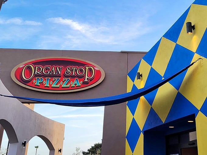 The bold sign against that distinctive checkered façade – where dinner comes with music that fills your soul.