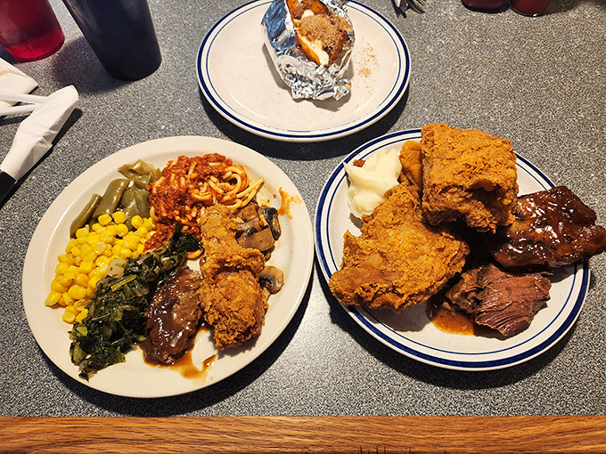 Two plates that tell the story of buffet strategy—a little of everything, with tactical emphasis on the fried chicken battalion.
