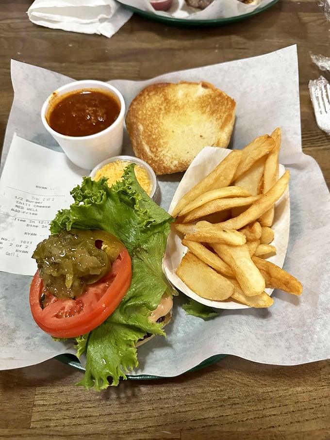 A burger so photogenic it deserves its own Instagram account, with mac and cheese that's clearly not from any blue box.