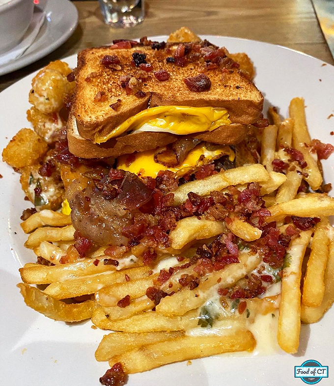 Toast standing in for buns? Genius! This burger monstrosity isn't just a meal—it's a commitment ceremony between you and your appetite.