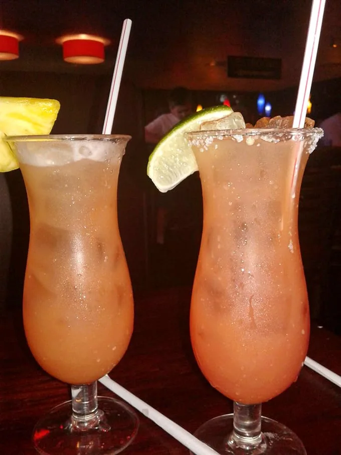 These tropical drinks aren't just beverages—they're vacation in a glass, complete with that little paper umbrella of escapism we all need.