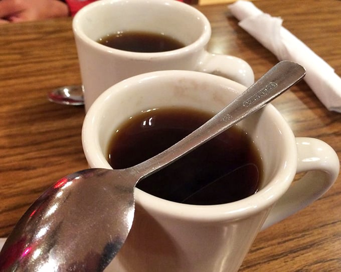 Two sturdy white mugs of coffee—the kind that doesn't need fancy names or foam art to get the job done right.