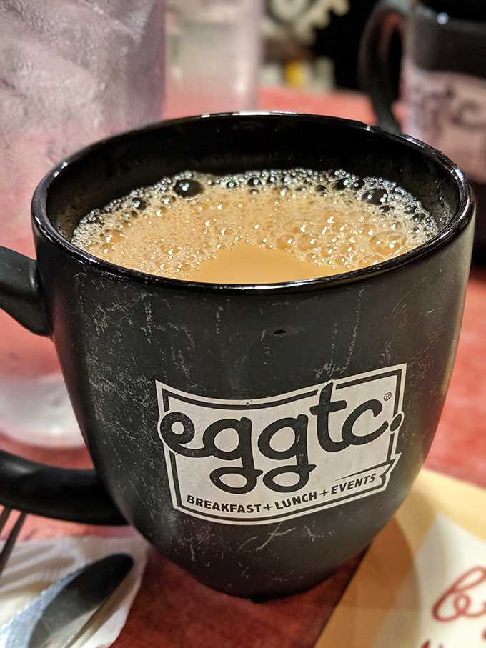 The coffee mug says it all—this isn't just a caffeine delivery system, it's the opening act to a breakfast performance you won't forget.