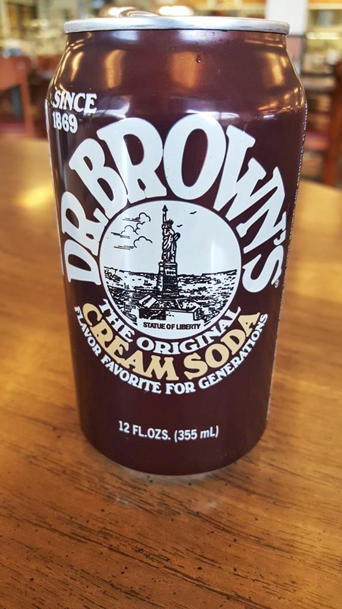 Dr. Brown's Cream Soda—the unofficial champagne of delicatessens since 1869. That Statue of Liberty knows what's up.