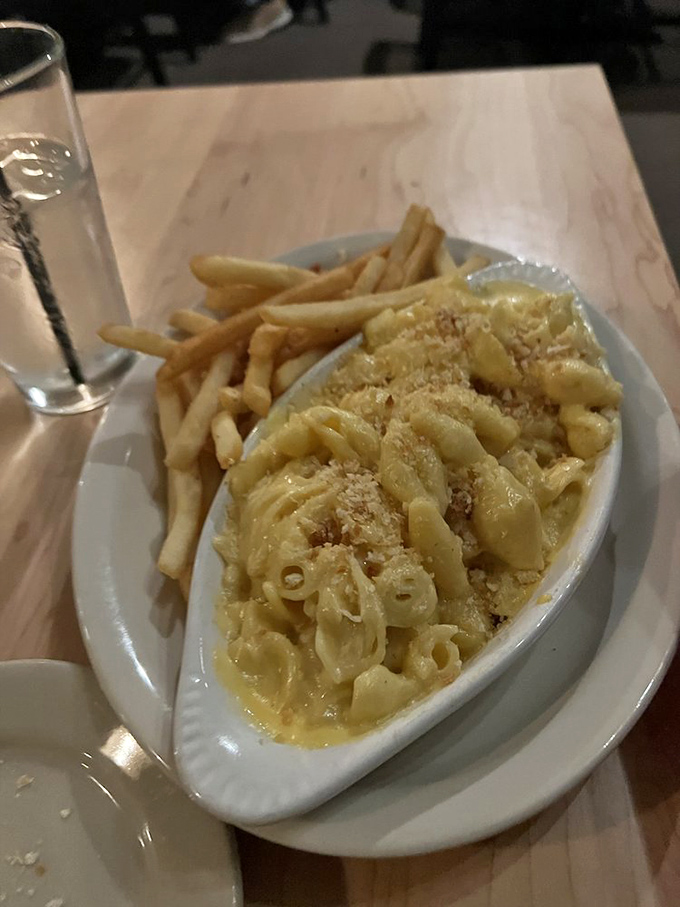 Mac and cheese that's achieved the perfect golden crust-to-creamy interior ratio—the kind that ruins boxed versions forever.
