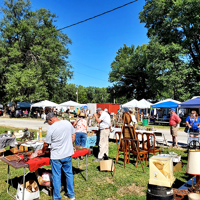 Sunshine and blue skies create the perfect backdrop for serious antiquing. Every table holds possibilities; every vendor has stories to tell.