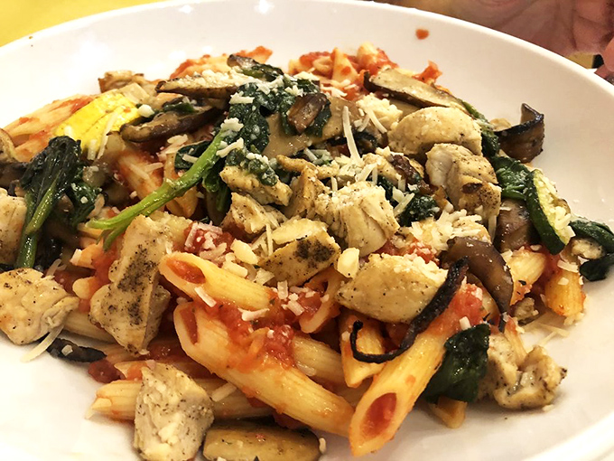 Pasta that doesn't hide behind heavy cream, letting fresh vegetables and perfectly seasoned chicken take their rightful place in the spotlight.