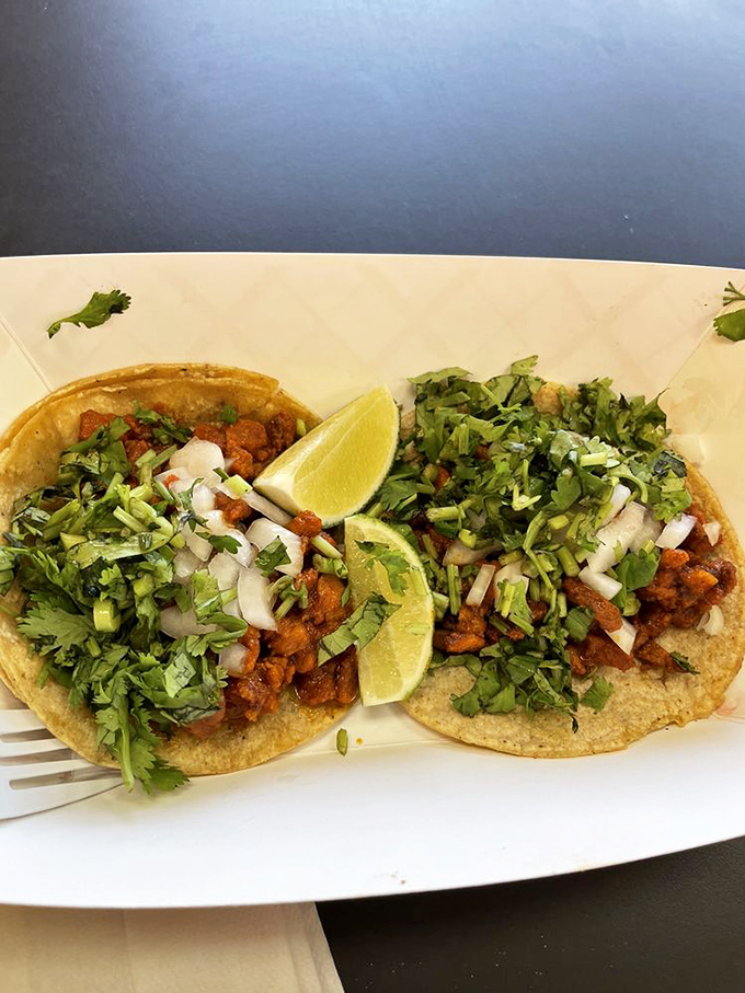 Tacos that understand the importance of proper veggie distribution. This is democracy in food form—every chip gets its fair share of toppings.