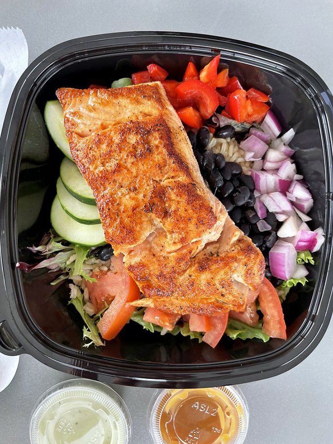 Blackened fish rests atop a garden of greens and beans. When healthy eating feels like cheating the diet gods.