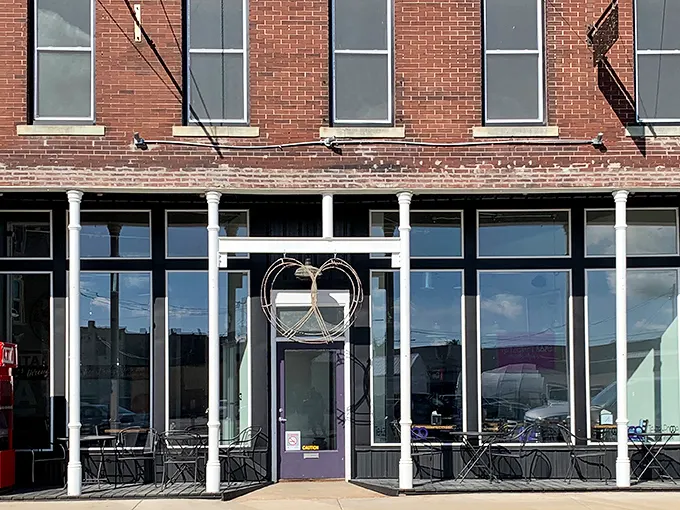 This elegant storefront with its heart-shaped entrance whispers rather than shouts. A refined respite from Casey's more exuberant attractions.