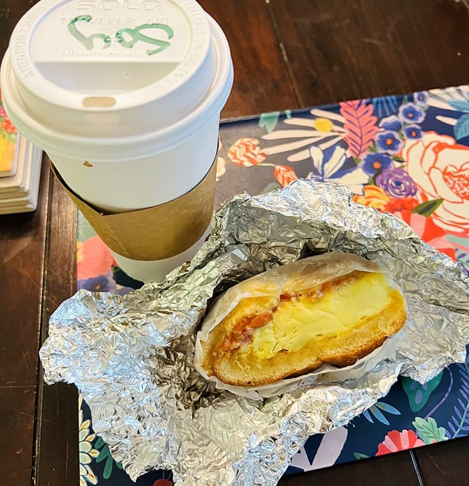 Breakfast sandwiches should be enshrined in museums. This ham and egg masterpiece on a bagel makes morning meetings almost bearable.