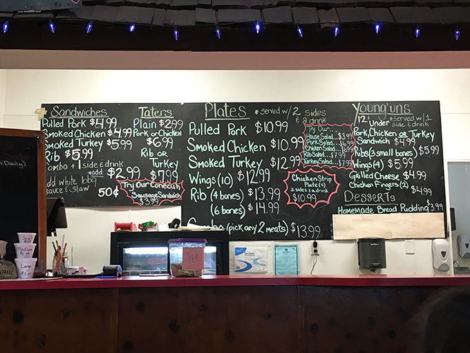 The chalkboard menu at BBQ 65 reads like poetry to hungry souls—simple words that translate to "prepare for flavor nirvana."