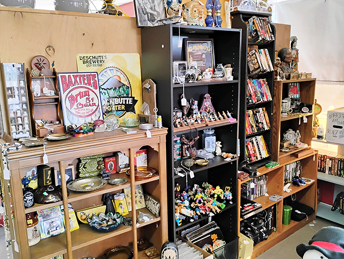 Every shelf tells a story—this one's a mixtape of pop culture, vintage toys, and nostalgic knickknacks. Spot anything from your childhood?