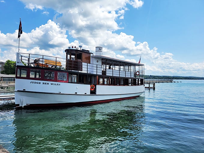 The Judge Ben Wiles tour boat awaits passengers for dining cruises across Skaneateles Lake—floating feasts with panoramic views that beat any restaurant window seat.