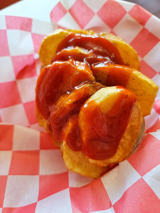 Those potatoes aren't just a side—they're main characters in their own delicious drama, waiting for their ketchup curtain call.