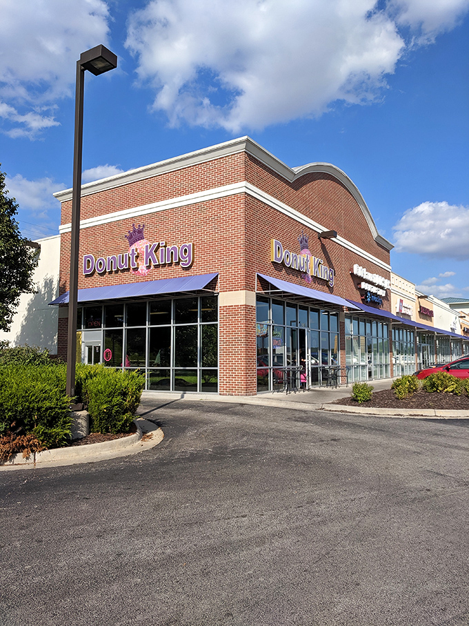 The purple benches say it all – royalty awaits inside this brick fortress of frosted delights.