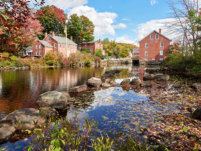 Harrisville's brick buildings reflect in still waters – creating the kind of symmetry that makes amateur photographers look professional.