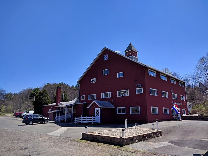 Kev's iconic red barn stands like a beacon for bargain hunters, promising rural charm and unexpected treasures inside.