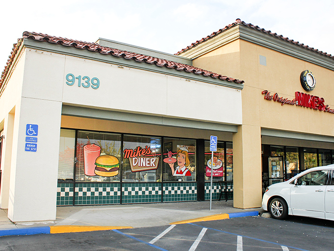 Original Mike's window art tells you everything you need to know—burgers, shakes, and a side of nostalgia served all day.