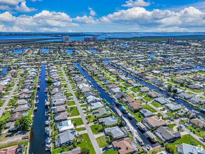 The aerial view of Cape Coral's canals shows why boat owners flock here – a watery neighborhood where your backyard is also your marina.
