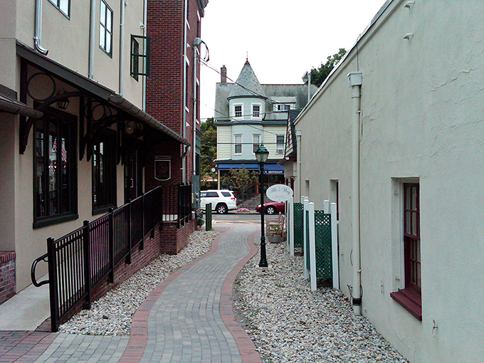 Alleyways in Clinton aren't shortcuts—they're discoveries waiting to happen, brick-paved invitations to the road less traveled.